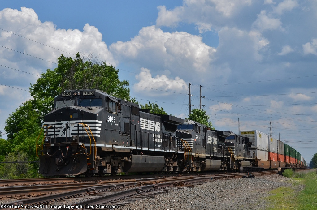 NS 9165 is westbound.